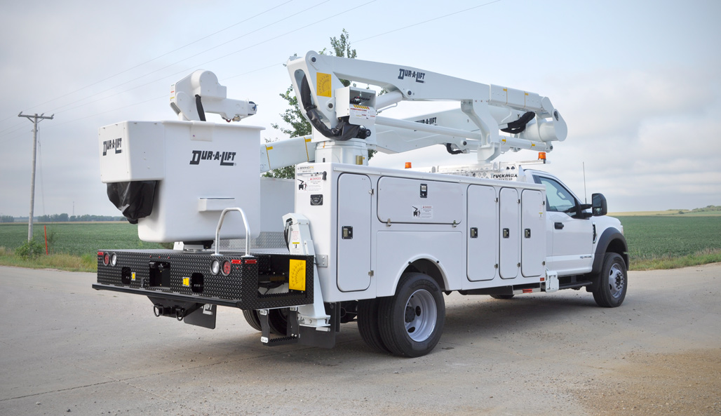 Reach Up to 59 Feet from a 22,000 GVWR Chassis - Dur-A-Lift Inc.